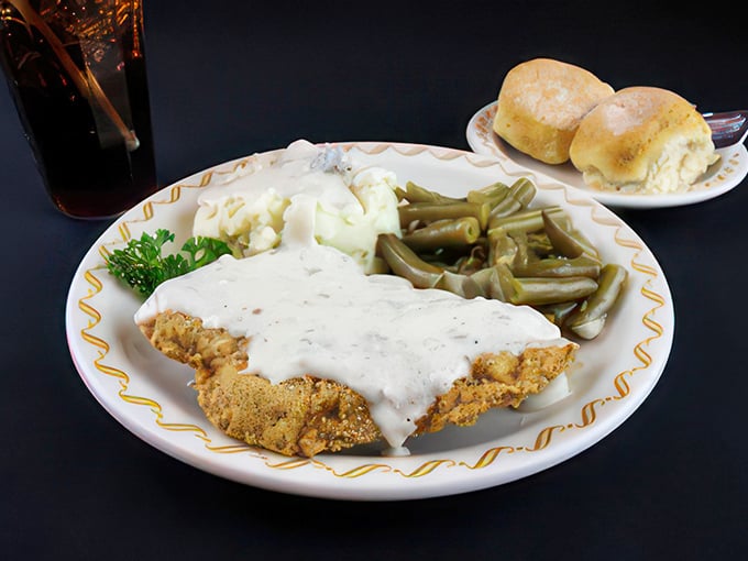 The star of the show: country fried steak swimming in pepper-flecked gravy with sides that know their supporting role perfectly.