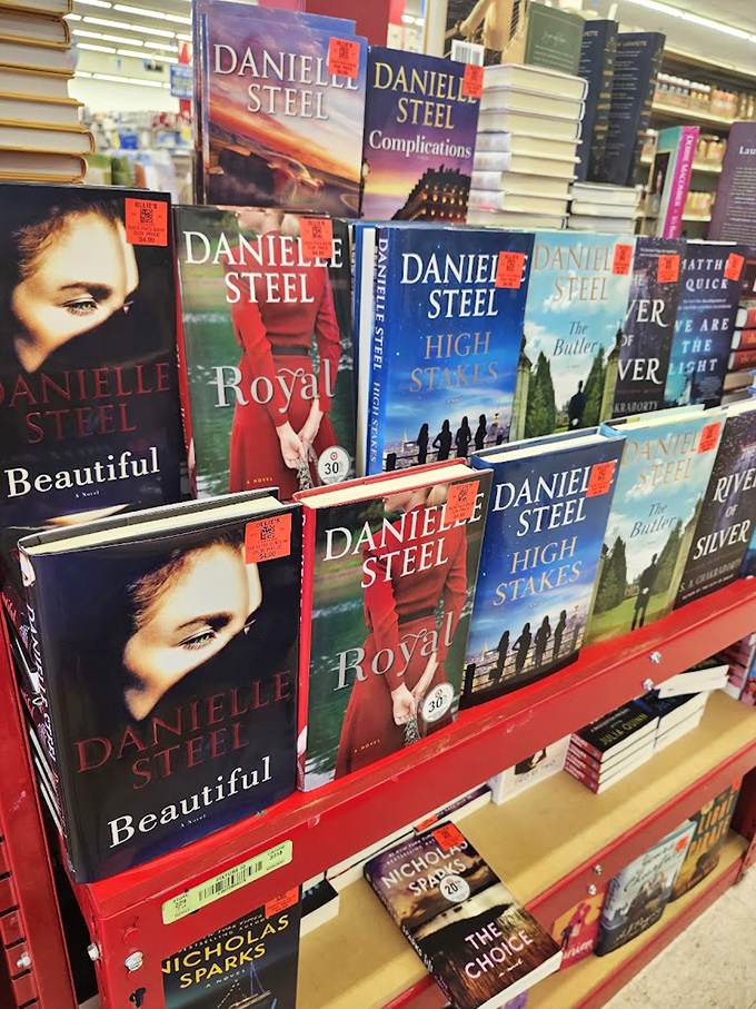 Danielle Steel's dramatic covers line the shelves like soap operas in paper form, waiting to transport readers to glamorous worlds for a fraction of retail.