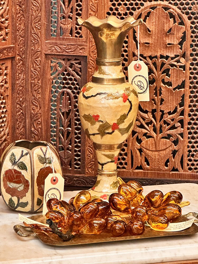 Intricate woodwork meets delicate porcelain in this corner of cultural collision. One person's forgotten heirloom becomes another's conversation piece.