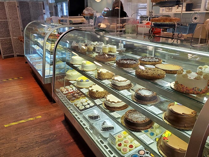 The glass case of temptation &ndash; where diet plans go to die and happiness is measured in layers of frosting. 