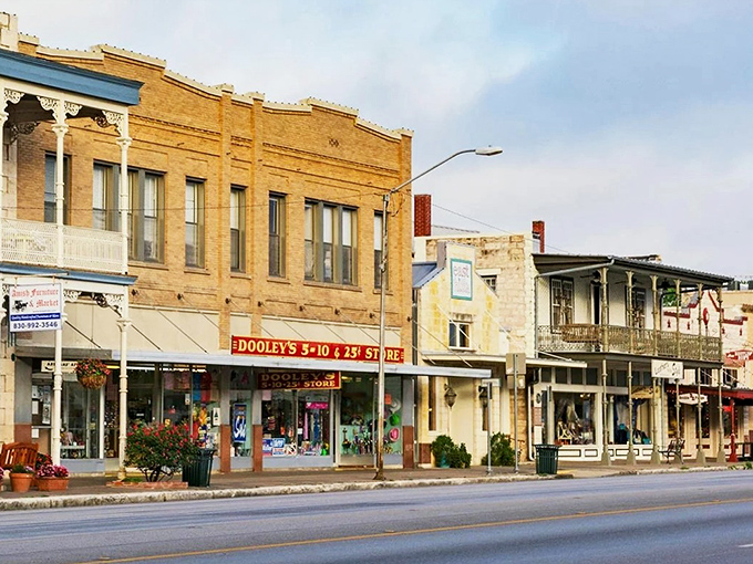 Dooley's 5-10 & 25¢ Store anchors a stretch of beautifully preserved storefronts that have witnessed generations of shoppers. A living museum of retail history.