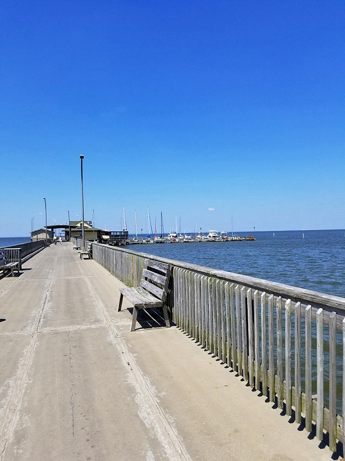 Fairhope's Municipal Pier stretches toward the horizon like an invitation, offering one of the best sunset viewing platforms on Alabama's coast.