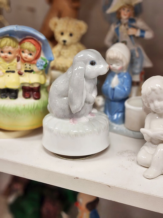 Porcelain figurines tell silent stories of past lives, like this bunny music box that's surely witnessed decades of gentle winding.