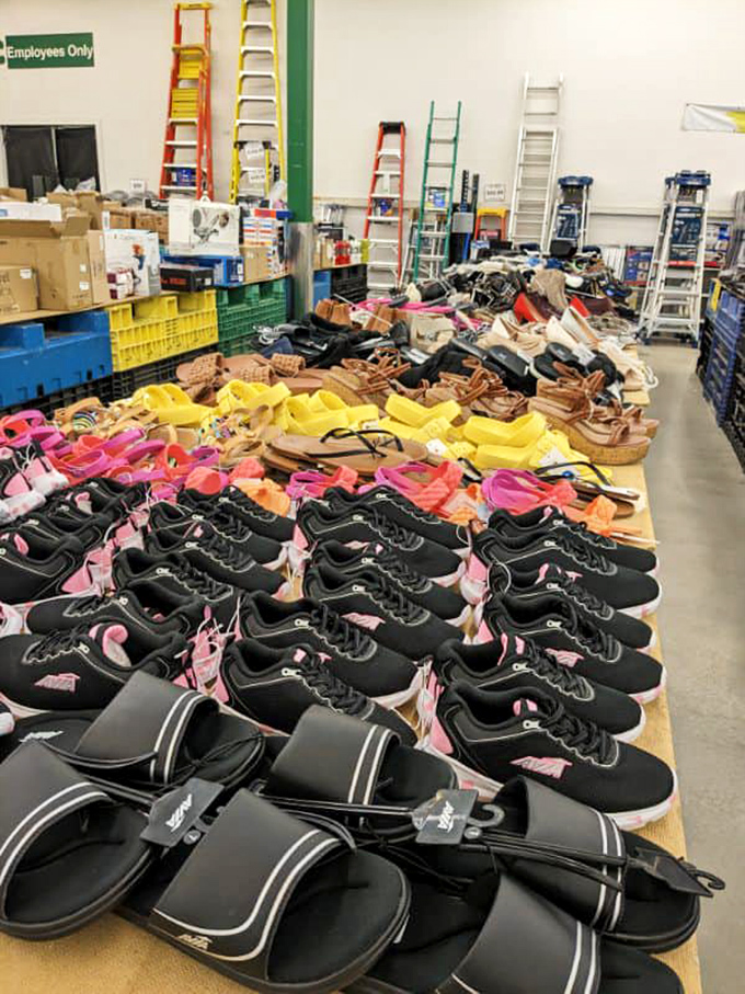 A sea of footwear awaits new homes. Like Cinderella's ball but with better prices and no midnight deadline.