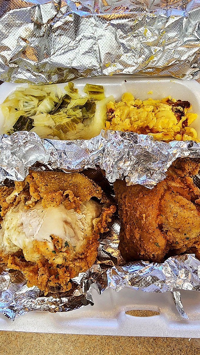 Soul food geometry: the perfect triangle of crispy fried chicken, collard greens, and mac and cheese. Einstein couldn't have calculated a more satisfying equation.