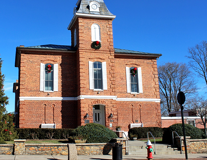 The stately brick courthouse stands as Brevard's architectural crown jewel, its tower keeping watch over the town since the late 19th century.