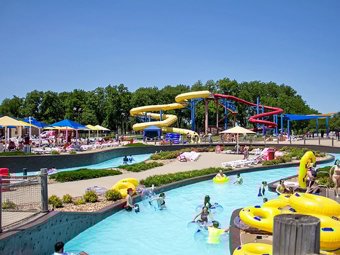 Missouri's answer to the Mediterranean coast: a lazy river winds through landscaped terrain while yellow tubes carry blissfully horizontal humans to nowhere in particular.