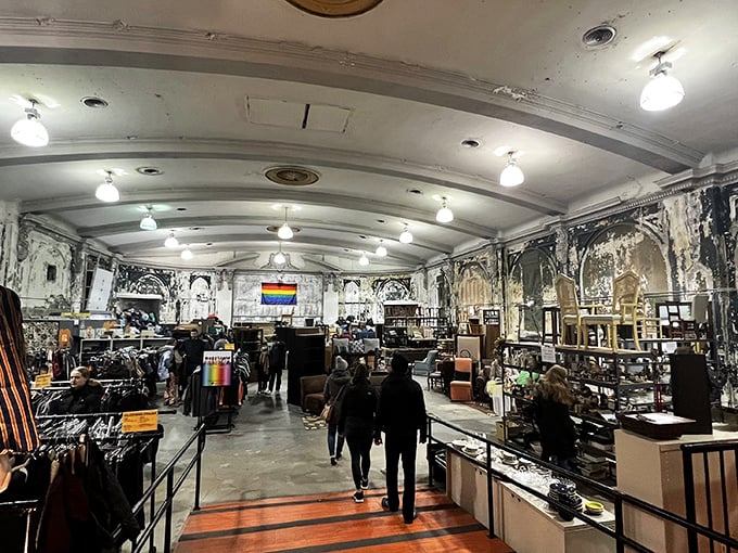 Step into a cathedral of commerce where vaulted ceilings and weathered walls create the perfect backdrop for treasure hunting.