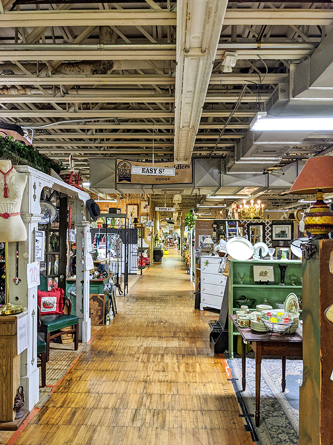 These wooden-floored aisles stretch toward possibilities, each vendor's booth a chapter in an ever-changing story of objects longing for new homes.