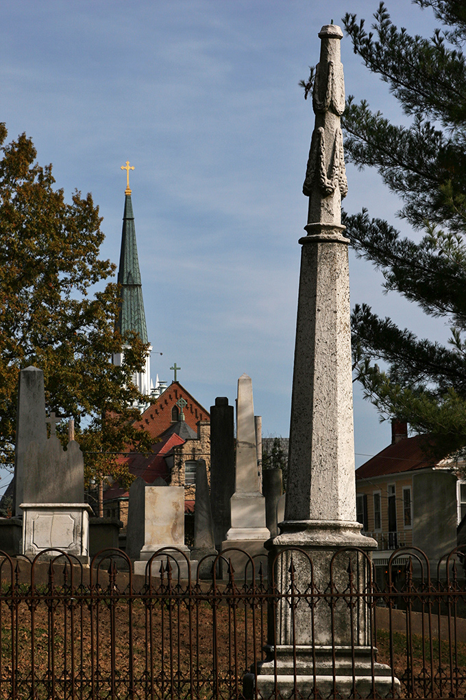 History stands tall in Ste. Genevieve's cemetery. These centuries-old monuments tell silent stories beneath the shadow of the church spire.