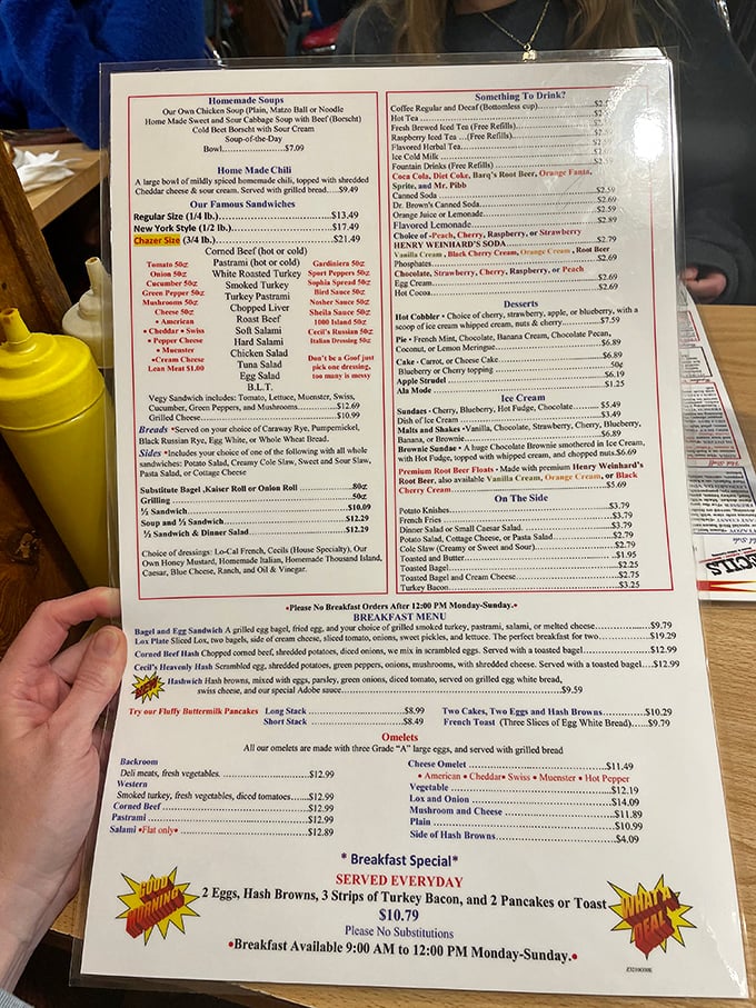 Behold, the sacred text of sandwich lovers! This menu is like a roadmap to flavor town, with pit stops at Pastrami Peak and Matzo Ball Mountain.