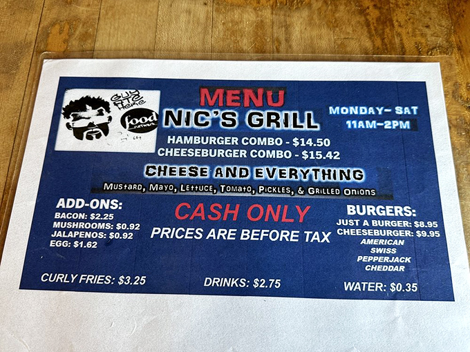 A menu so straightforward it's practically poetry&mdash;burger, cheeseburger, and a few add-ons. No fancy adjectives needed when the food speaks for itself.