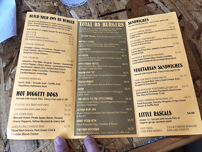 The menu reads like a love letter to burger enthusiasts, offering everything from basic cheeseburgers to towering creations that might require engineering permits.