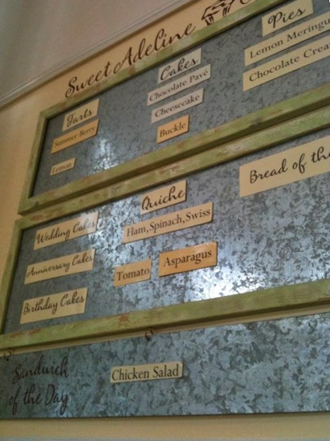 This menu board isn't just a list&mdash;it's a roadmap to happiness. Each handwritten card represents a different path to culinary bliss.