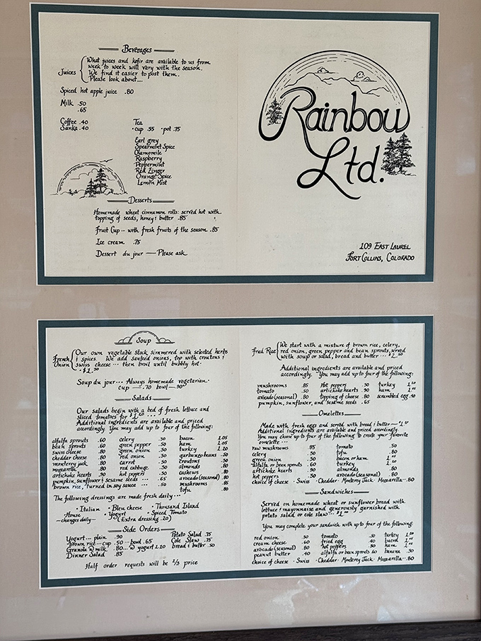 A vintage menu that tells stories of meals past. Notice the hand-drawn rainbow logo—a charming throwback to simpler, delicious times.