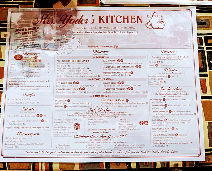 A menu that reads like a love letter to comfort food. Notice that prayer at the bottom&mdash;in Amish Country, gratitude isn't just suggested, it's printed right on the placemat.