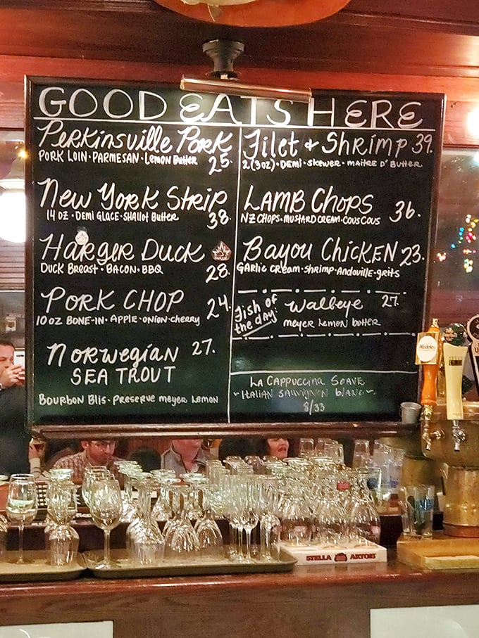 The chalkboard menu at Bonge's reads like a love letter to carnivores, with each dish description a tantalizing promise of the flavor journey ahead.