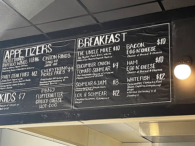 Decisions, decisions! This menu board is like a culinary choose-your-own-adventure novel. Will you go for "The Uncle Mike" or dare to tackle the mysterious "Everything Pickle Fries"?