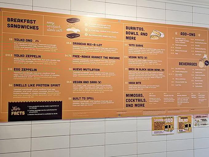 A menu board where classic rock meets breakfast brilliance. Each sandwich name deserves its own Grammy nomination.