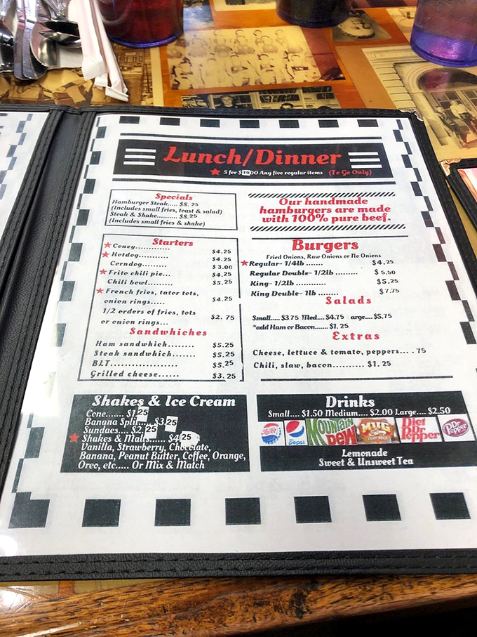 No fancy font or pretentious descriptions needed. This straightforward menu tells you exactly what you're getting&mdash;handmade burgers and classic comfort.
