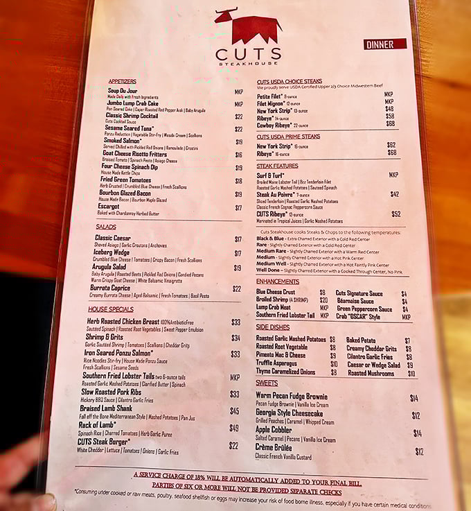 A menu that reads like poetry to carnivores. Each description promises a journey worth taking, especially that Southern Fried Lobster Tail.