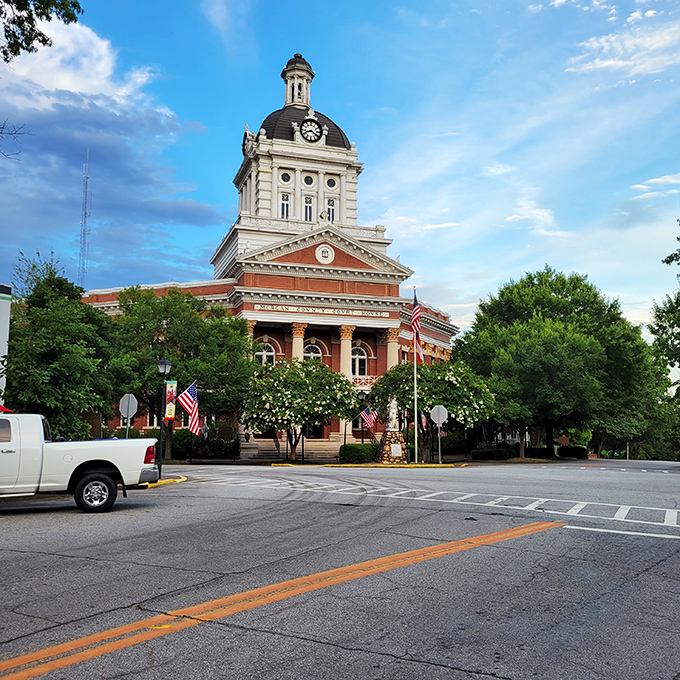 Morgan County Courthouse commands attention with its magnificent dome—architectural swagger that would make Jefferson himself tip his tricorn hat.