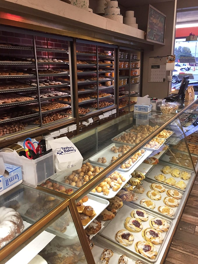 A pastry lover's paradise awaits behind the glass—rows of donuts, Danish, and delights that make choosing just one the day's most delicious dilemma.