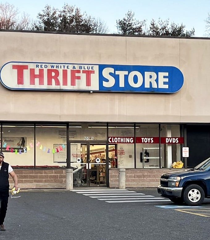 The entrance beckons with promises of "CLOTHING, TOYS, DVDs" &ndash; the holy trinity of thrifting that's impossible to resist on a Saturday afternoon.