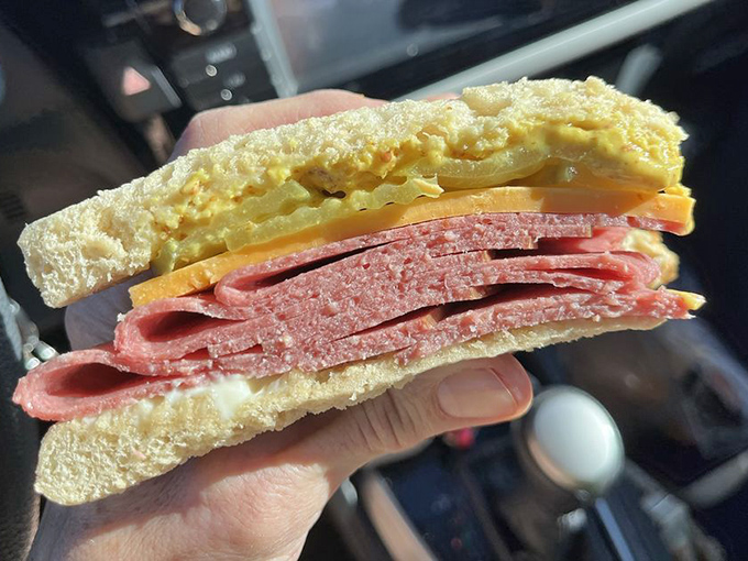 The humble bologna sandwich, reinvented! Thick-sliced meat, sharp cheddar, and the perfect condiment ratio create a nostalgic masterpiece worth the drive.