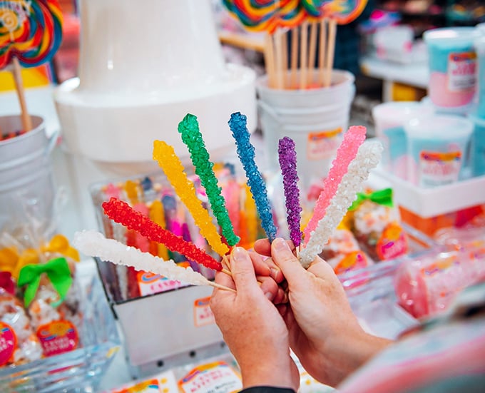 Rainbow rock candy sticks: nature's crystals reimagined as edible magic wands that make dentists nervously check their calendars.
