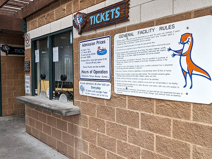 Where summer memories begin: the ticket booth that separates you from sweet aquatic relief during those triple-digit Kansas days.