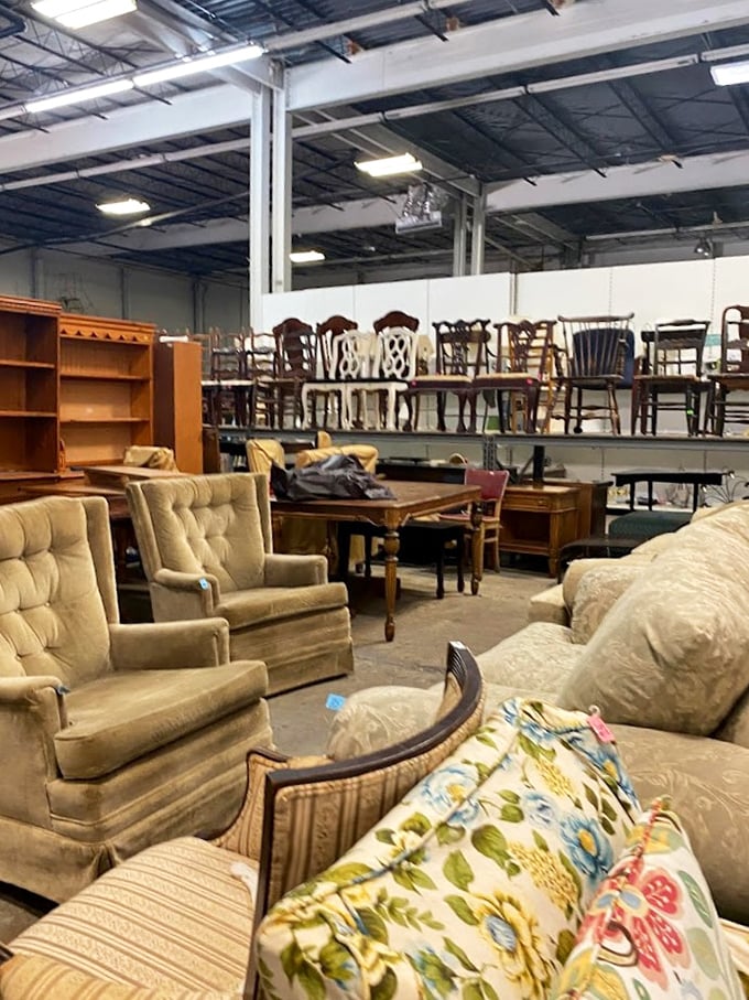 The furniture section resembles a living room museum spanning seven decades. That gold velvet armchair has stories to tell!