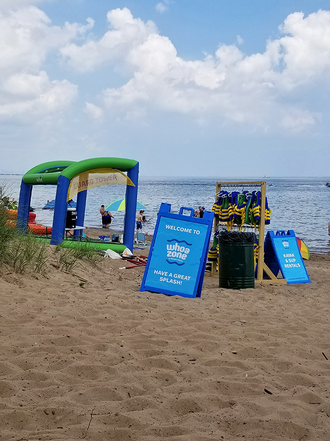 "Have a Great Splash!" promises the sign, in what might be the understatement of the summer. Life jackets await their next adventurous occupants.