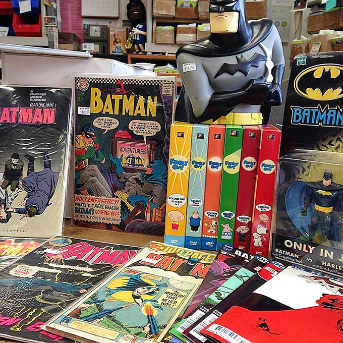 Holy collectibles, Batman! The Caped Crusader keeps watch over vintage comics that have survived longer than most of his sidekicks.