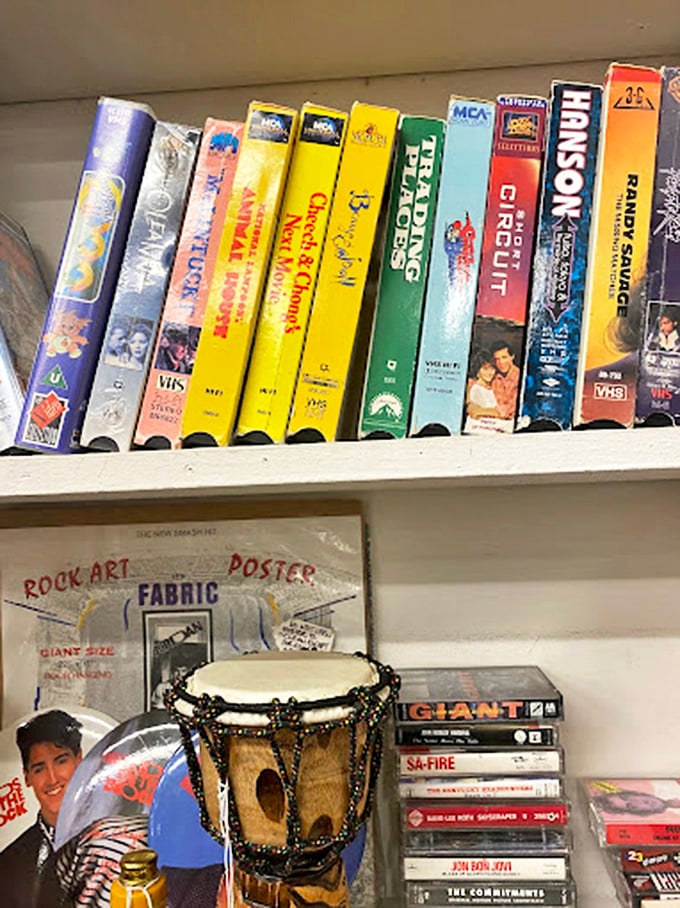Vintage VHS tapes line the shelves alongside cassettes and memorabilia &ndash; a nostalgic time capsule for anyone who remembers rewinding. 