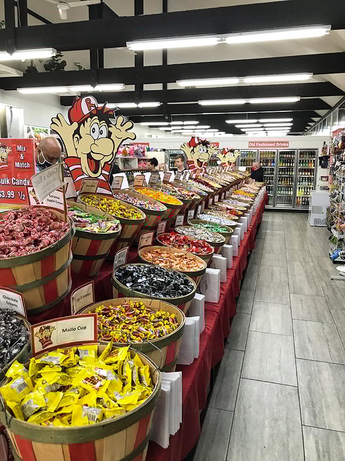 Wooden barrels of temptation line up like sweet soldiers ready for duty. Even Marie Kondo would approve of this organized chaos.