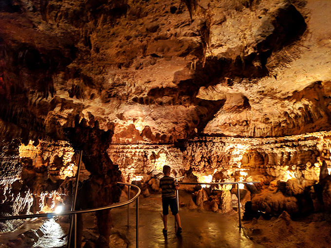 Inside Fisher Cave, millions of years of geological artistry create an underground cathedral that makes your average mansion look decidedly understated.