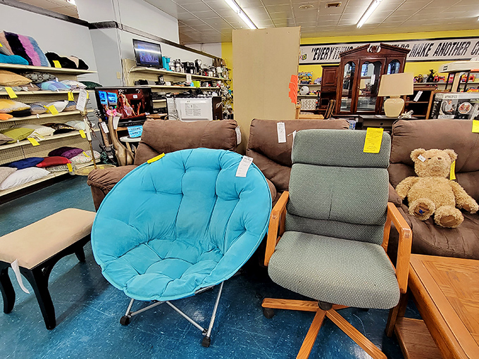The furniture section's silent question: "Why pay full price for comfort?" That turquoise papasan chair is practically begging for a new home.