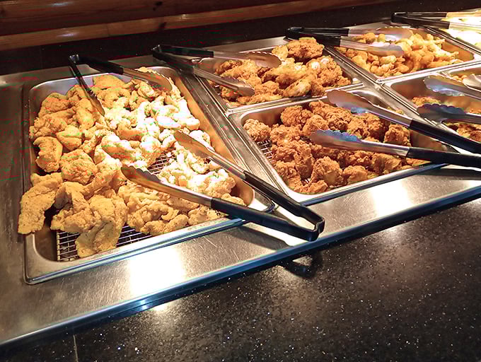 Golden treasures await at the buffet line. This isn't just fried food&mdash;it's edible sunshine that crunches between your teeth.