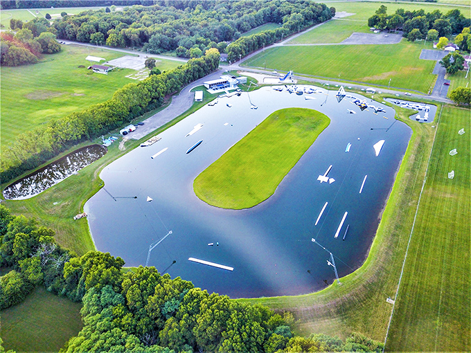 The aerial view showcases Wake Nation's ingenious design&mdash;a human-made lake surrounded by nature, with inflatable challenges awaiting the brave.
