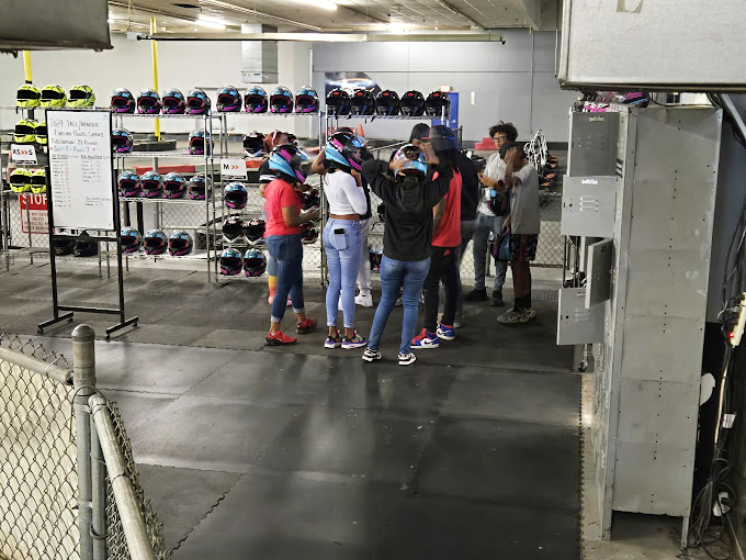 The helmet wall &ndash; where everyday accountants and teachers transform into their racing alter egos. Choose your identity wisely!