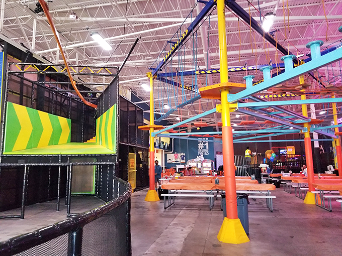 A kaleidoscope of colors greets visitors inside, where the ropes course and activity zones create a playground that makes adult knees weak with excitement.