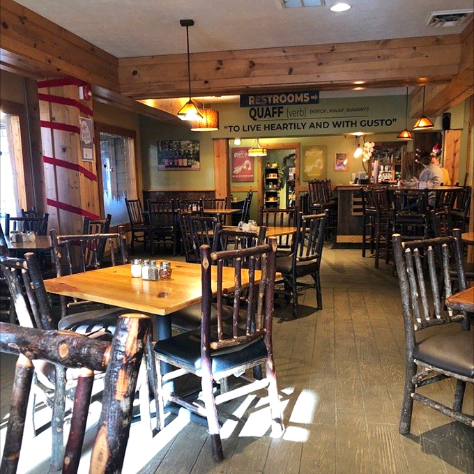 Rustic meets refined in Big Woods' dining room. Those hickory chairs and wooden beams aren't just decoration &ndash; they're setting the stage for comfort food elevated.