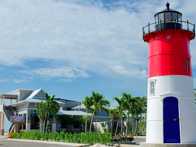 Not just a restaurant, but a landmark. The iconic red and white lighthouse stands sentinel, guiding hungry travelers to seafood nirvana.