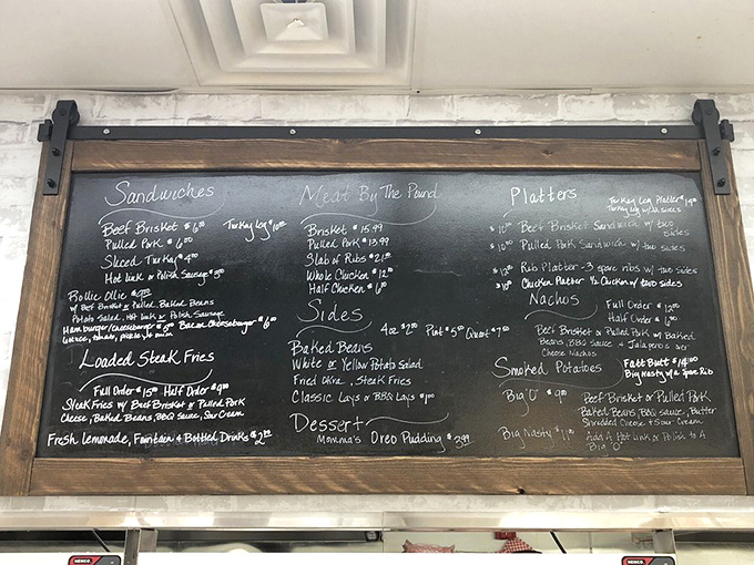 A chalkboard menu that reads like poetry to hungry souls. Each handwritten item represents hours of smoking dedication and generations of barbecue wisdom.