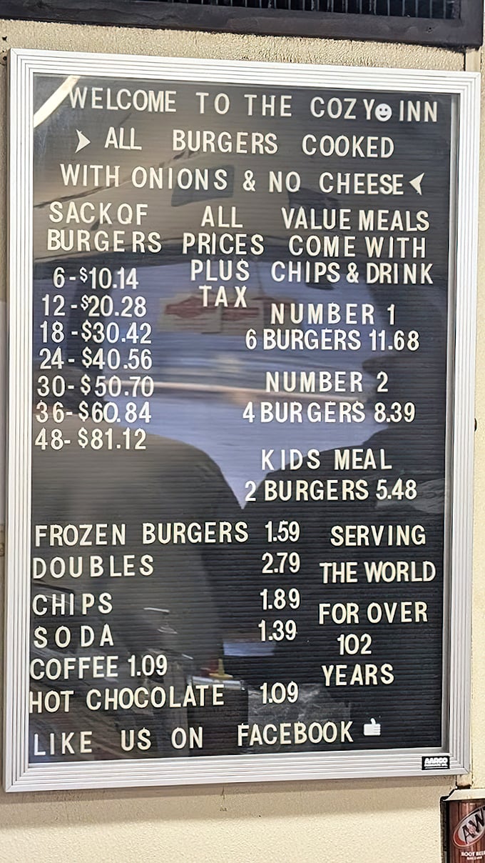 The menu board says it all: "All burgers cooked with onions & no cheese." In a world of endless options, there's beauty in simplicity.