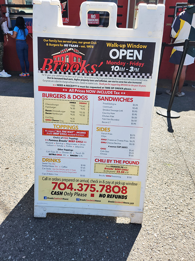 The sign says it all&mdash;five decades of family tradition, served "all the way" with that legendary secret chili recipe.