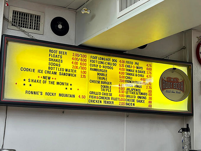 Simplicity is the ultimate sophistication on Carl's menu board, where burgers, dogs, and that legendary root beer await your decision.