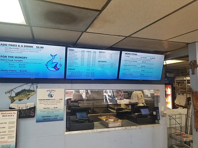 The menu board&mdash;seafood's greatest hits album. Each illuminated option promises a different journey through flavor country without leaving Kansas City.