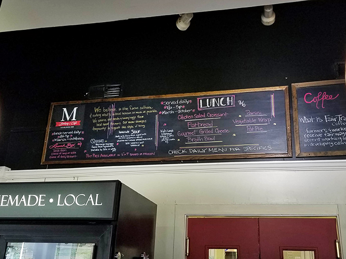 The chalkboard menu reads like poetry to the hungry soul. Each handwritten special promises a brief escape from reality into carb-laden bliss.
